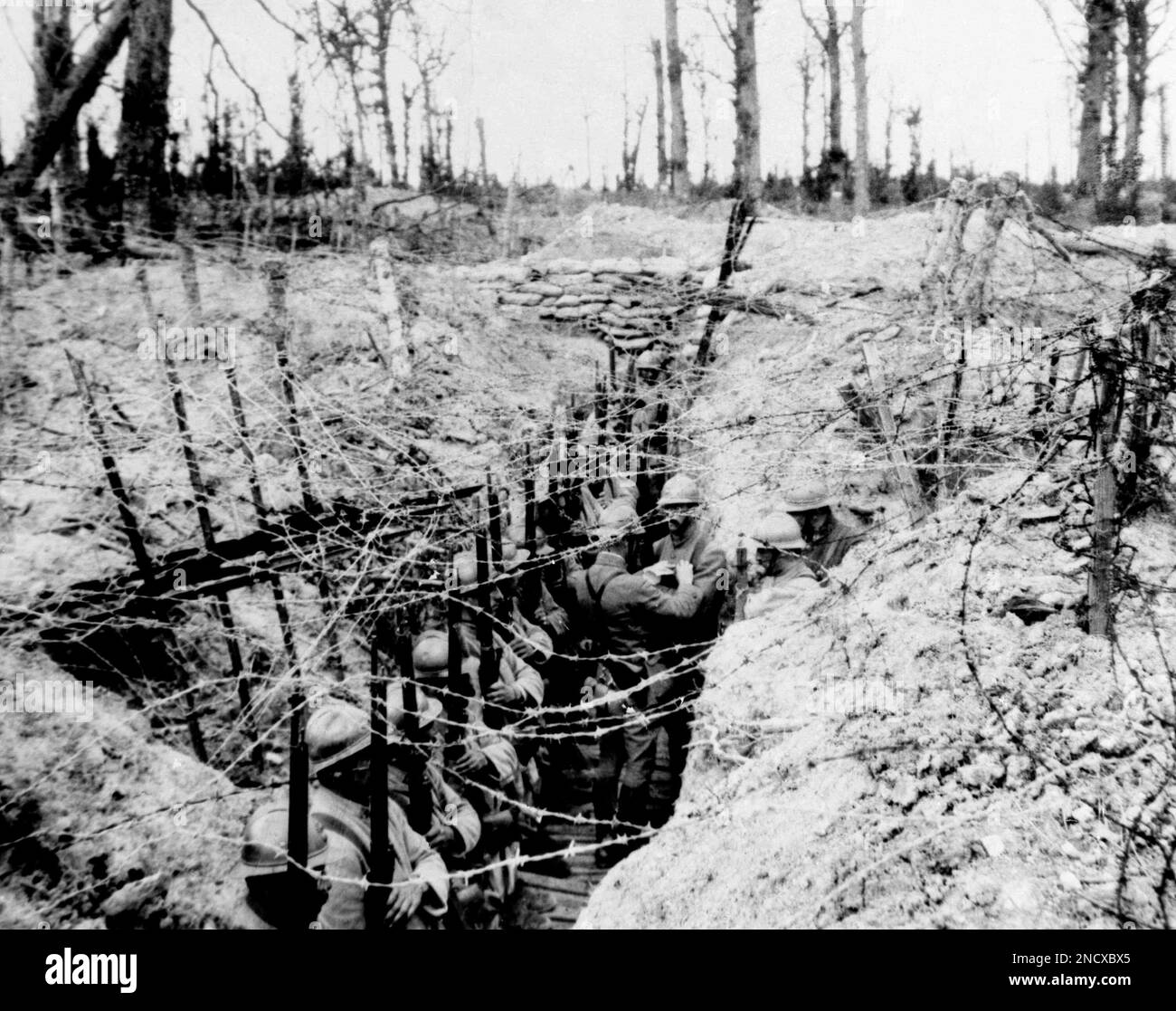 A French hero decorated in the Trenches. A stricking scene in a trench ...