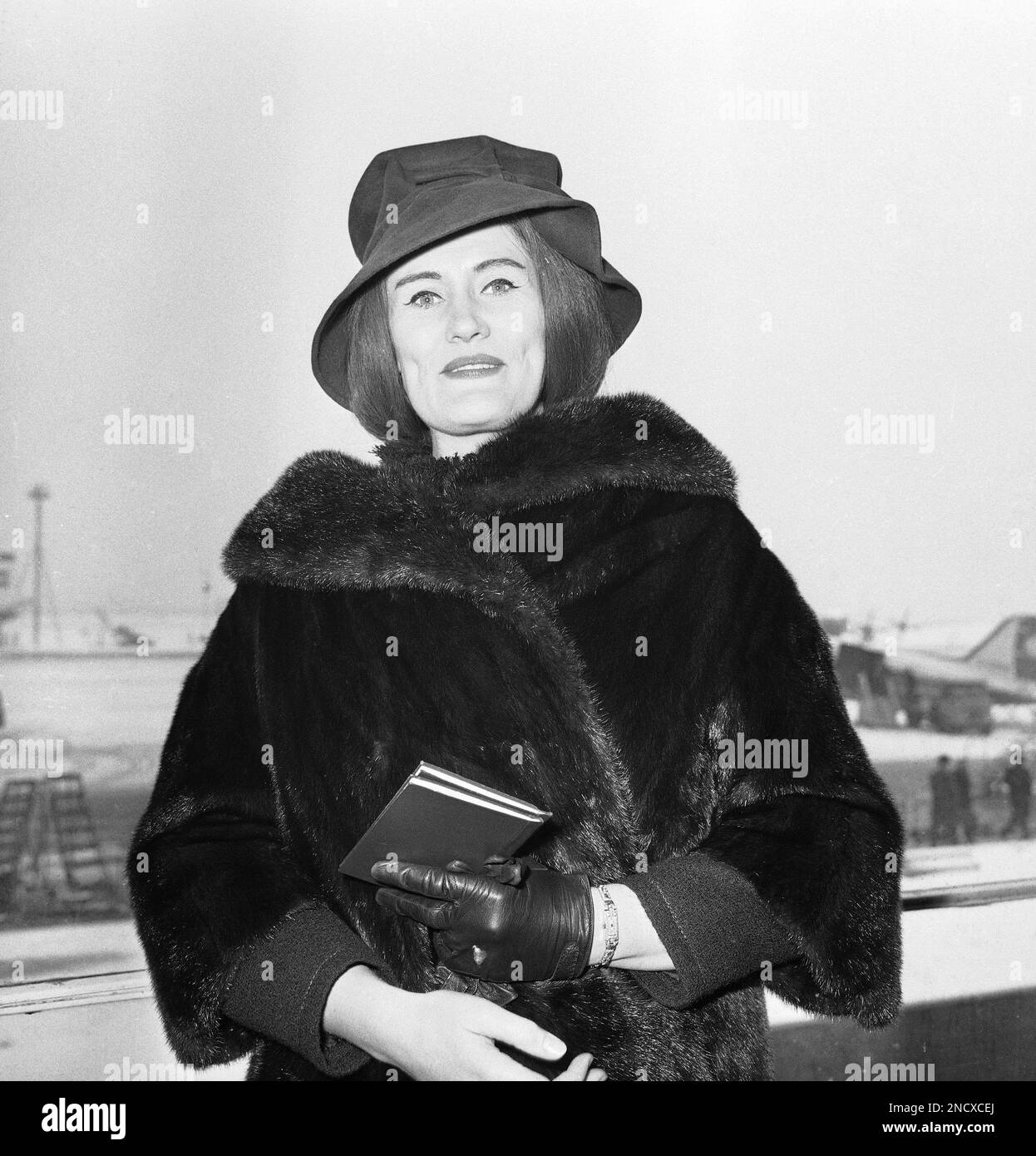 Australian opera singer Joan Sutherland warmly dressed in a fur coat ...