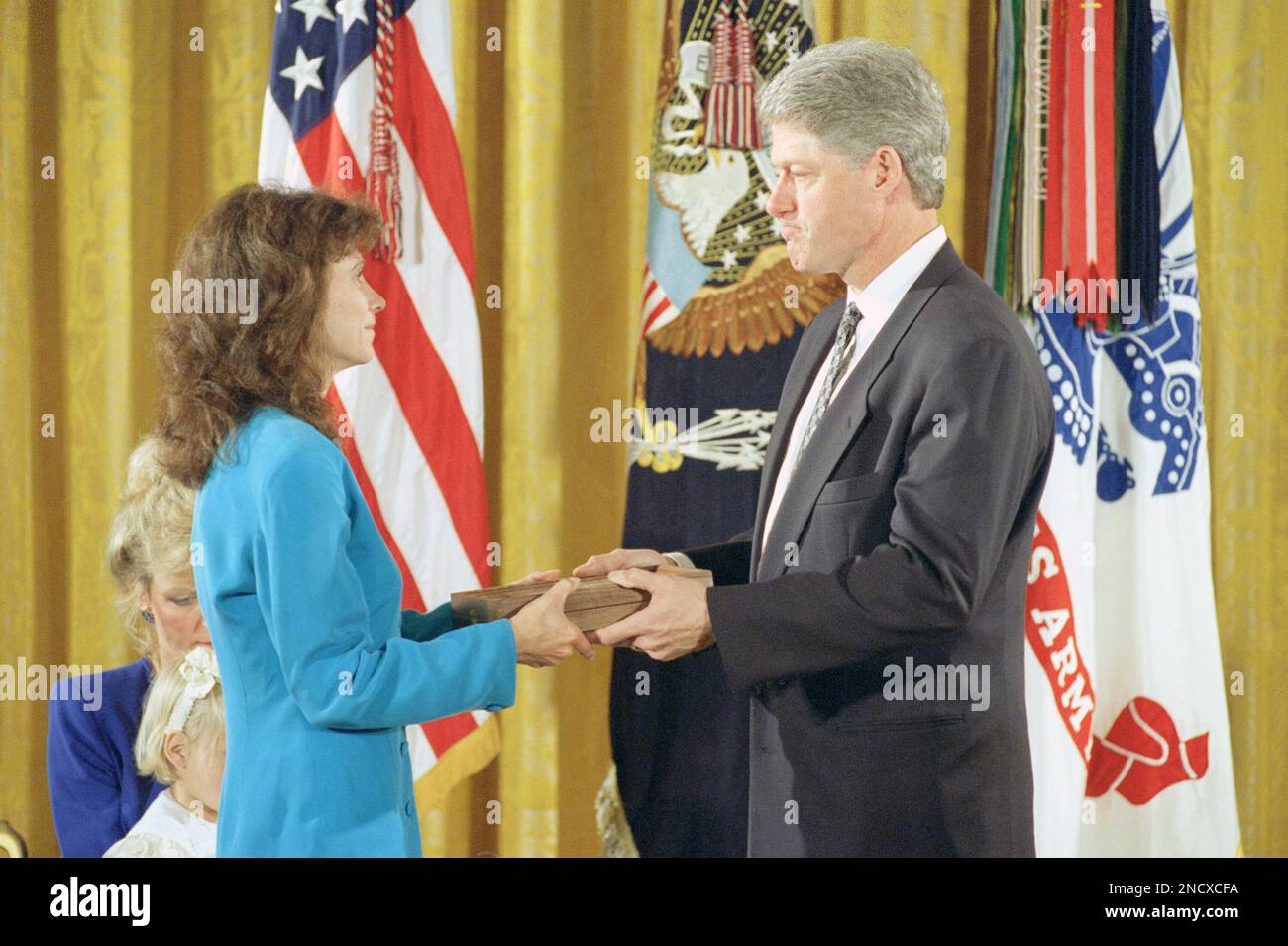 Stephanie Shughart accepts the Medal of Honor from President Bill ...
