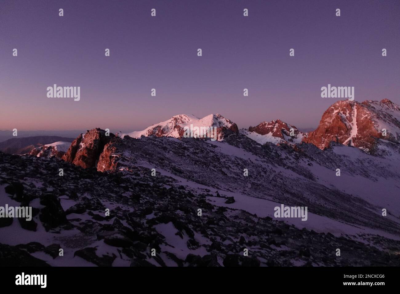 View of snow capped peaks from the summit of Mount Toubkal the highest ...