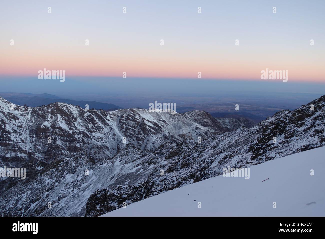View of snow capped peaks from the summit of Mount Toubkal the highest ...