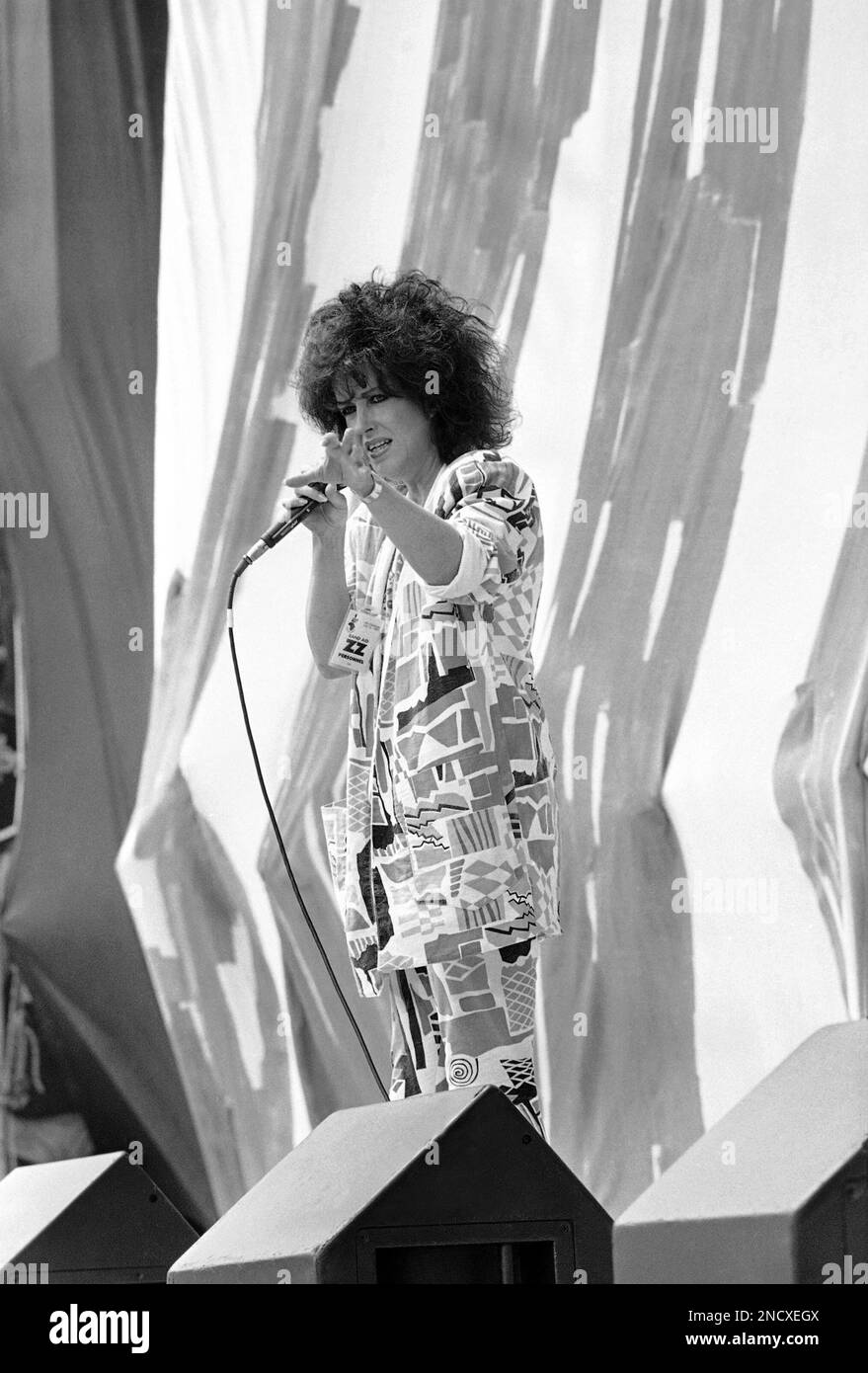 Grace Slick, who performed at Woods introduces the next act of the Live Aid concert at ...
