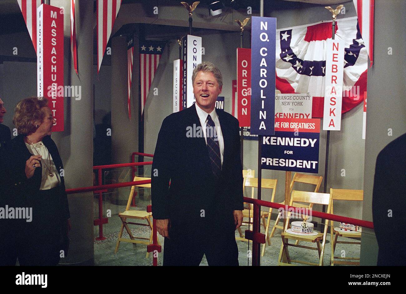 U.S. President Bill Clinton reacts as he tours an exhibit of the 1960 ...