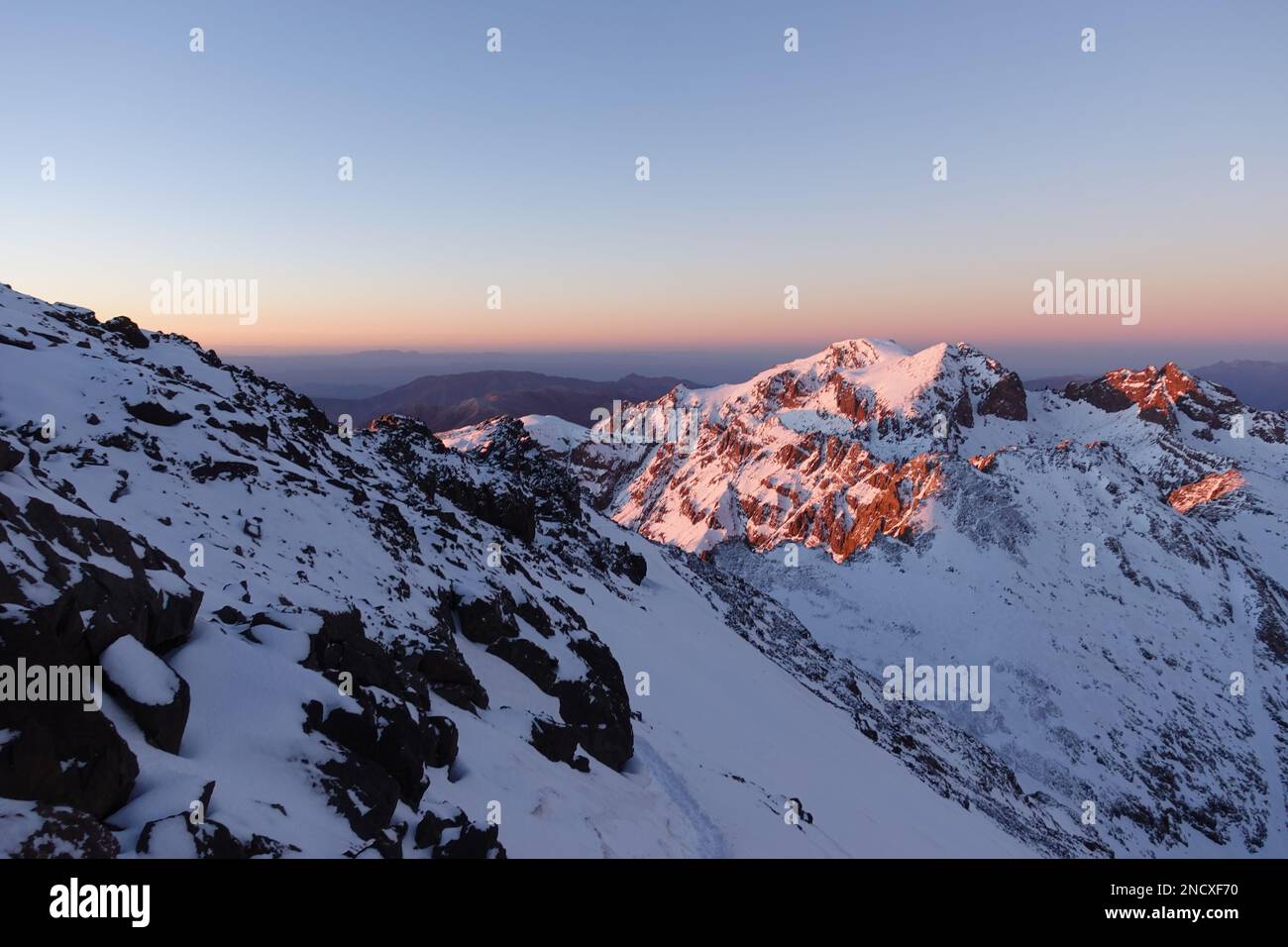 View of snow capped peaks from the summit of Mount Toubkal the highest ...