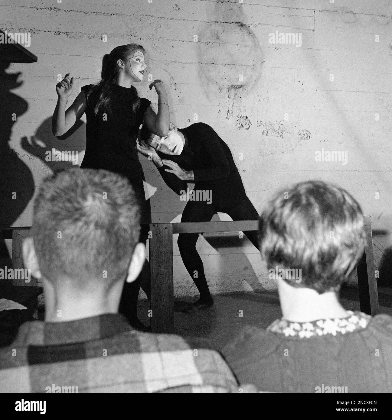 Gail Lucas, left, and Barre Dennen perform a pantomime duet for patrons ...