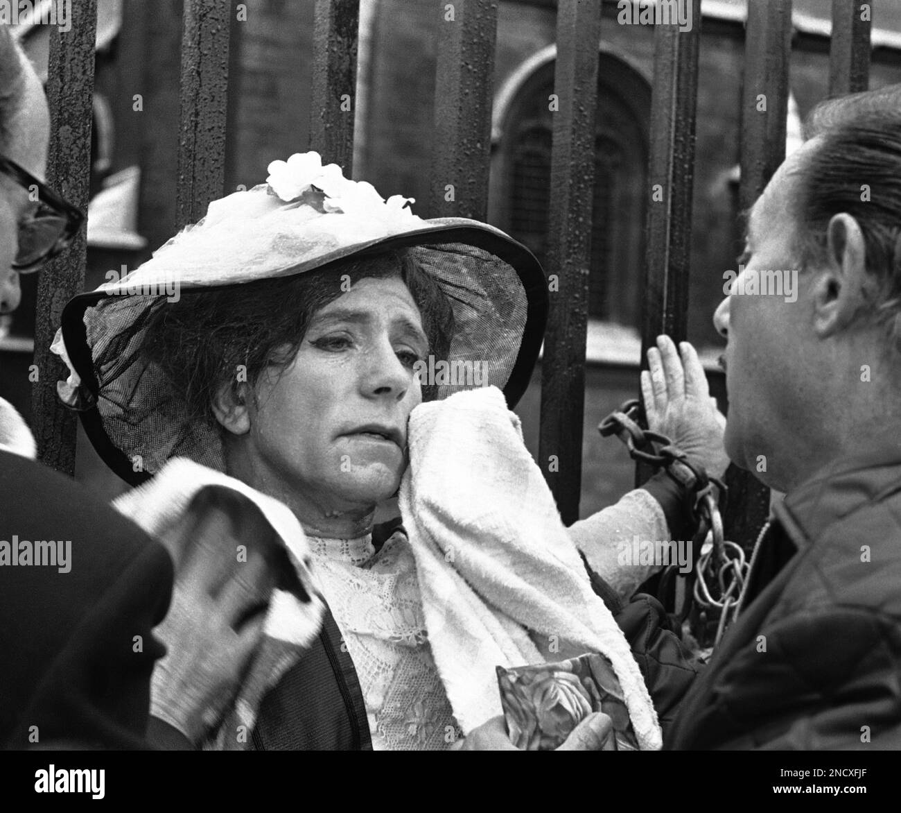 Comedian Norman Wisdom is dapped with a twoel after being soaked whilst ...