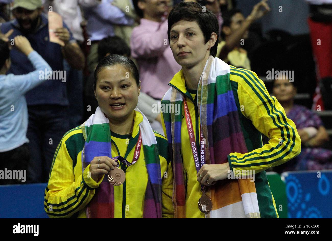Australia's He Tian Tang, left, and Smith Kate Wilson hold the bronze ...