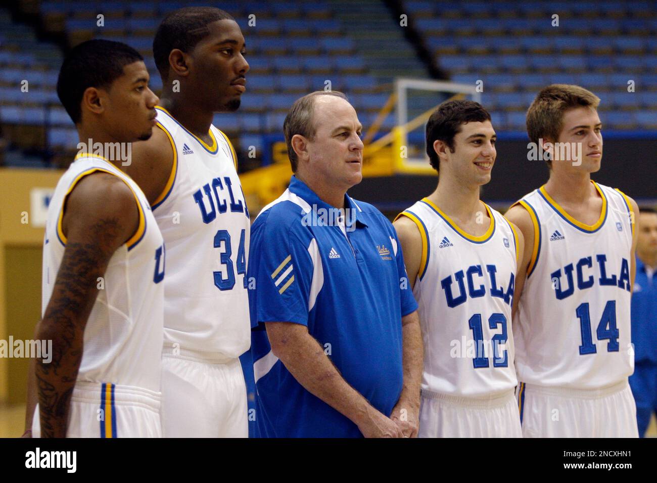 UCLA coach Ben Howland poses with freshmen, from left, Tyler Lamb ...