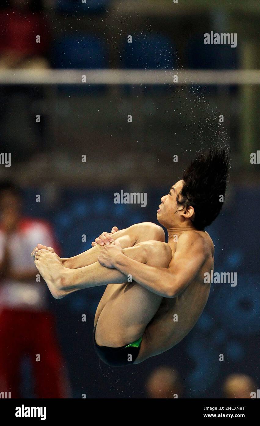 Malaysia's Bryan Lomas dives during the Men's 10m Platform final at the ...