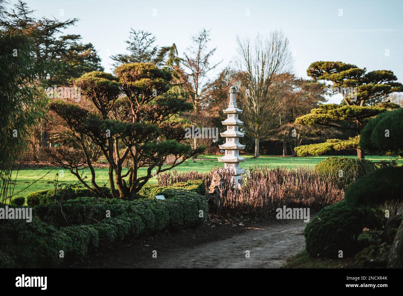 Japanese stone pagoda at a beautiful spring day Stock Photo - Alamy