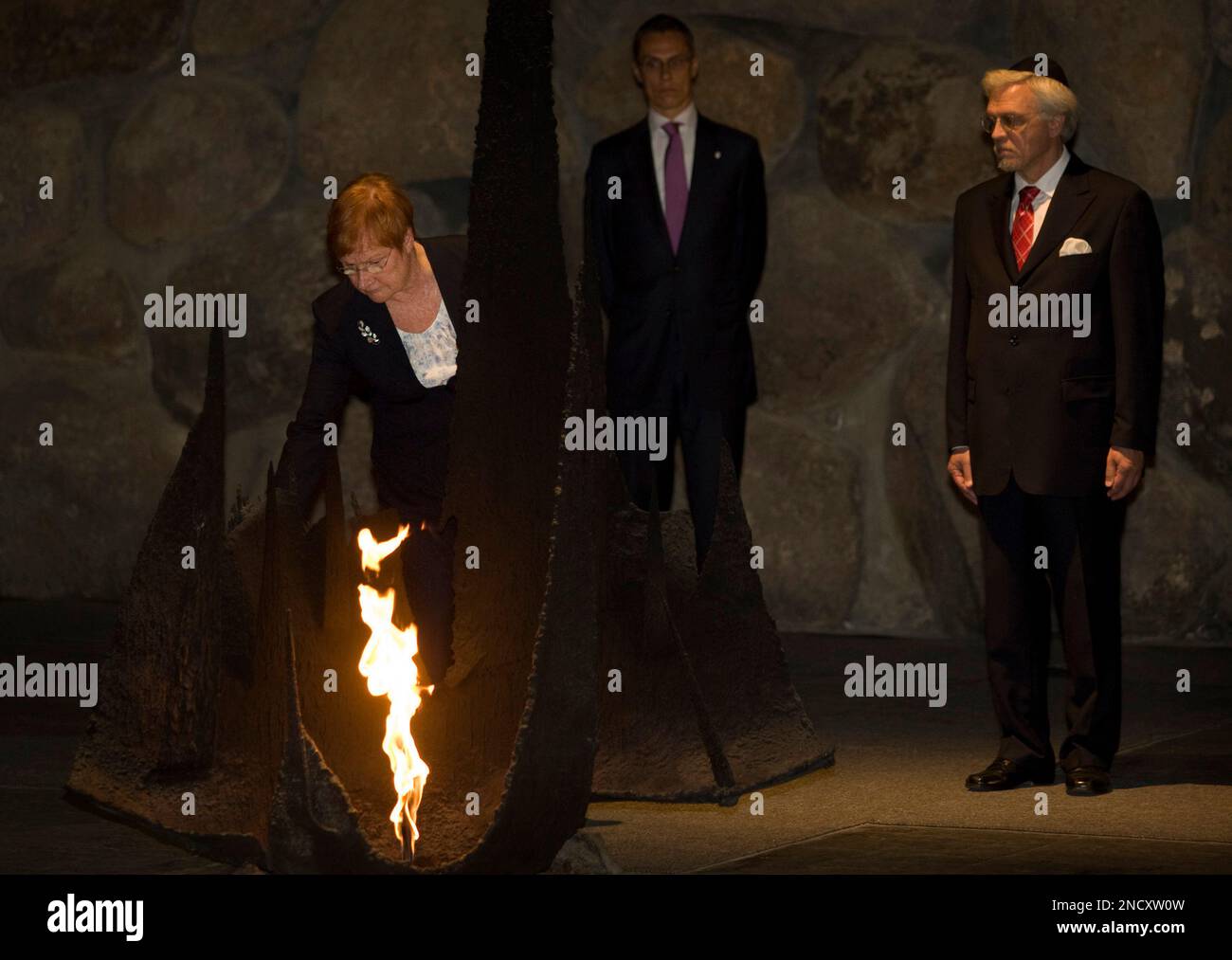 Finnish President Tarja Halonen rekindles the Eternal flame, as her ...