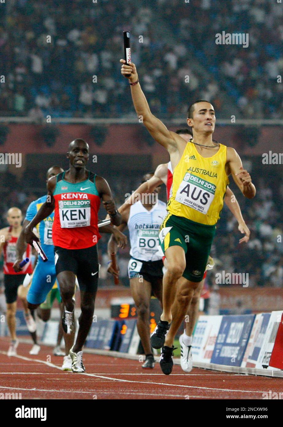 Australia's Sean Wroe, right, reacts as he crosses the finish line in ...