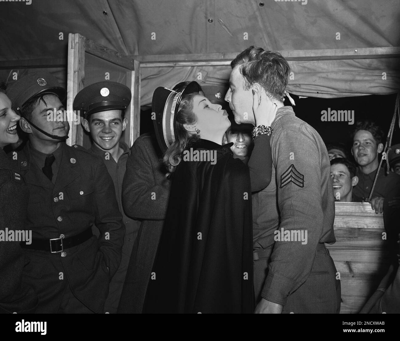 Martha Raye, stage and film comedienne wearing the cap and cape of an ...