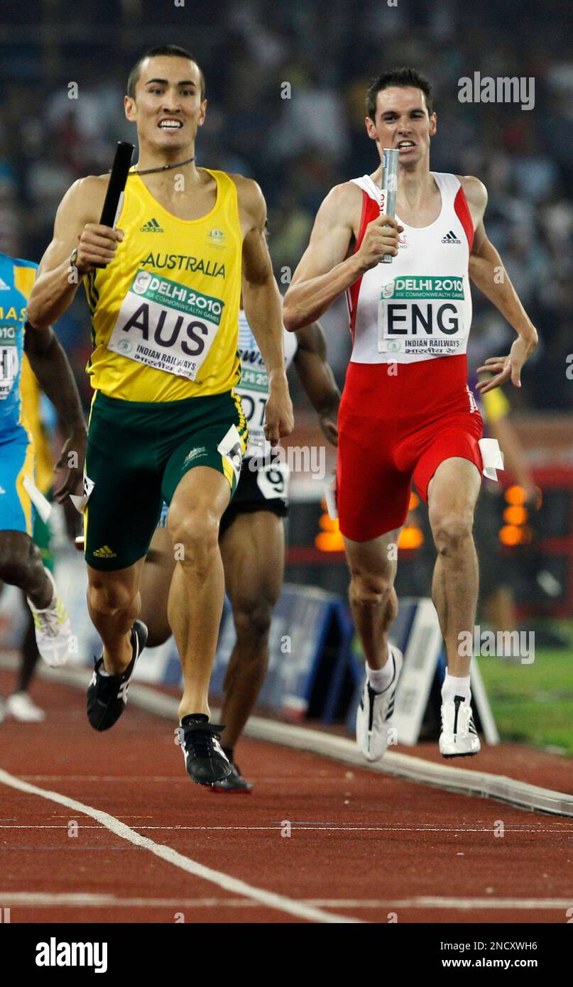 Australia's Sean Wroe, left, and England's Robert Tobin, right, go to ...