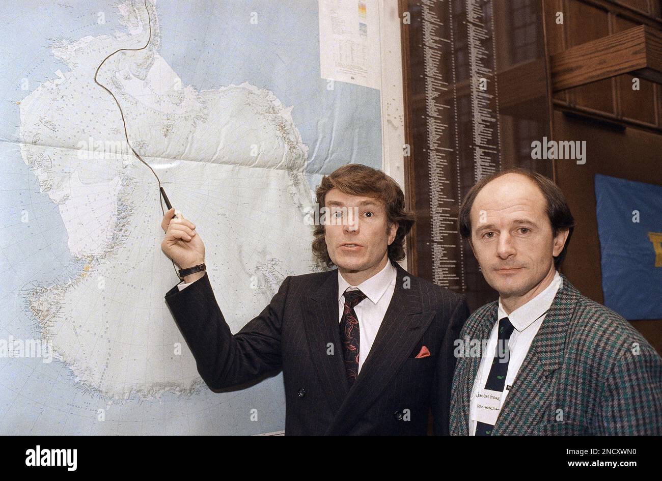 Will Steger, left, points to a map in New York on Dec. 1, 1987 to show ...