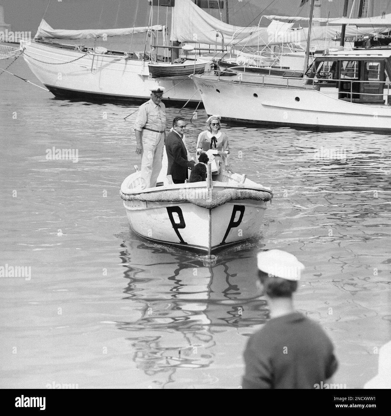 Prince Rainier of Monaco and his bride, former actress Grace Kelly, are ...
