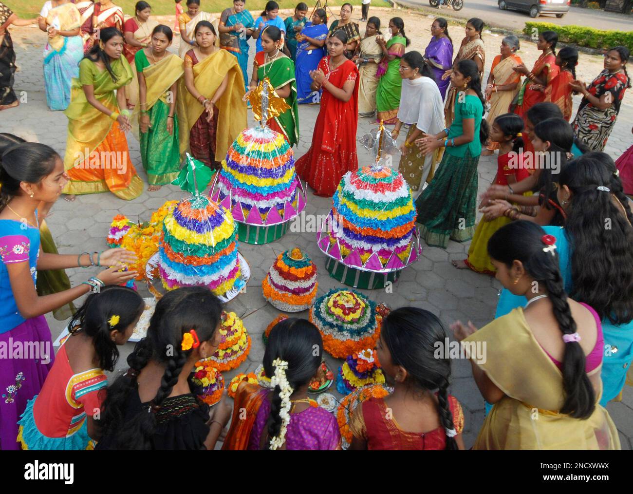 Members of India's main opposition Bharatiya Janata Party dance around ...