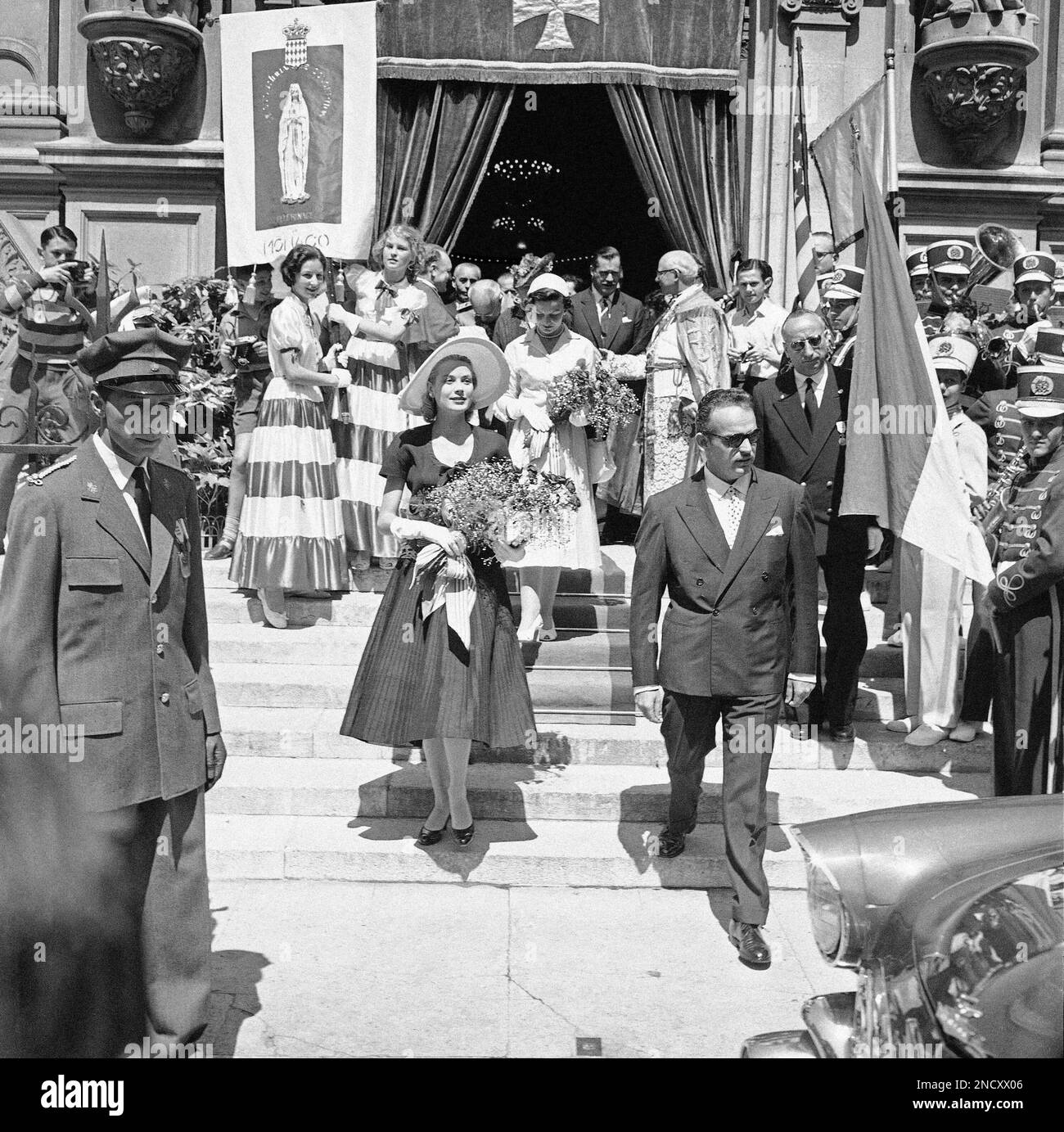Prince Rainier and Princess Grace of Monaco descend the steps of Monaco ...