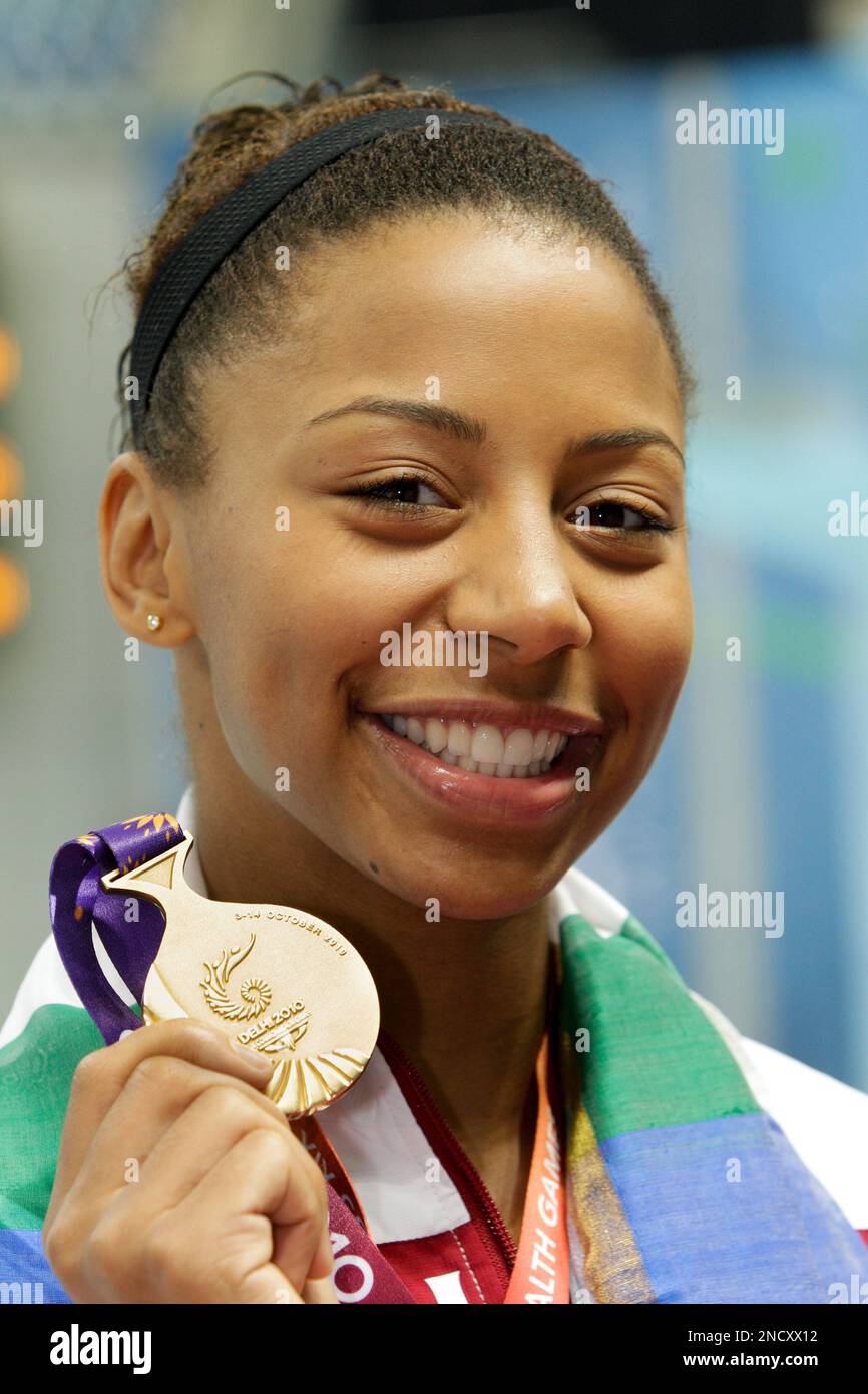 Canada's Jennifer Abel shows her gold medal in the women's 1m ...