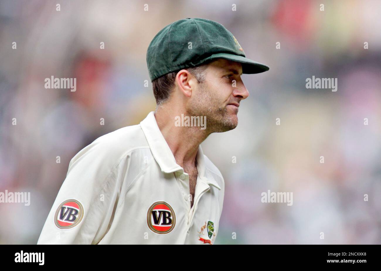 Australia's Simon Katich reacts as he walks back to the pavilion after ...