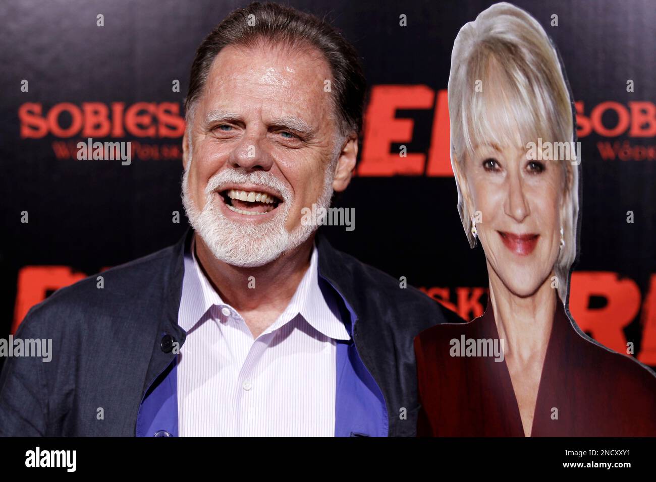 Taylor Hackford Left Arrives With A Cardboard Cutout Of His Wife