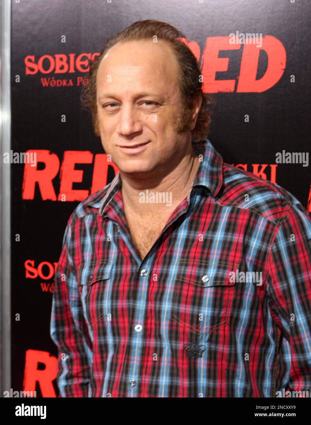 Scott Krinsky arrives at the Sobieski Vodka-sponsored premiere of "RED ...