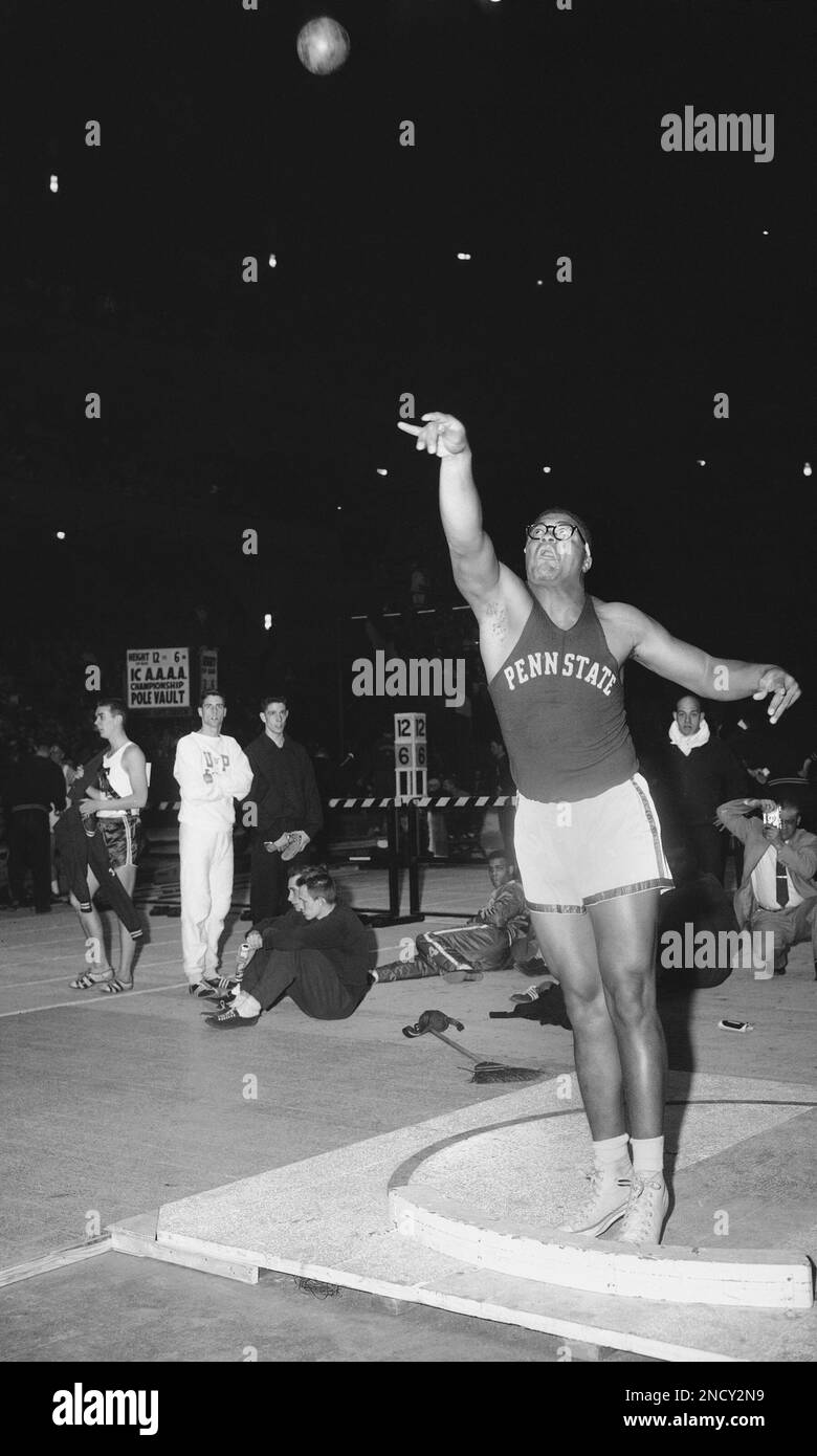 Roosevelt Grier of Penn State University gets off winning toss of 53 ...