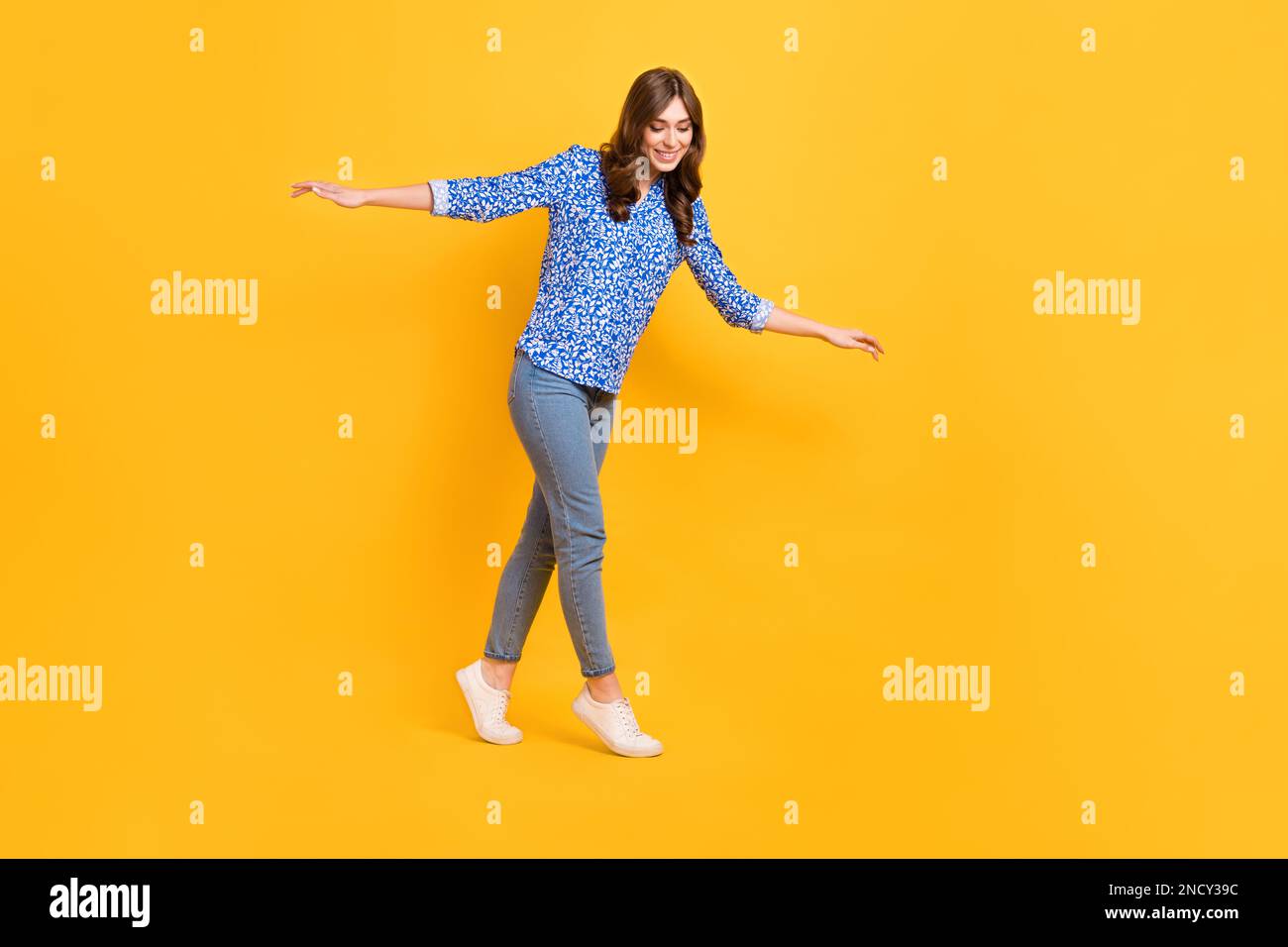 Full size profile photo of pretty satisfied girl carefully walk ...