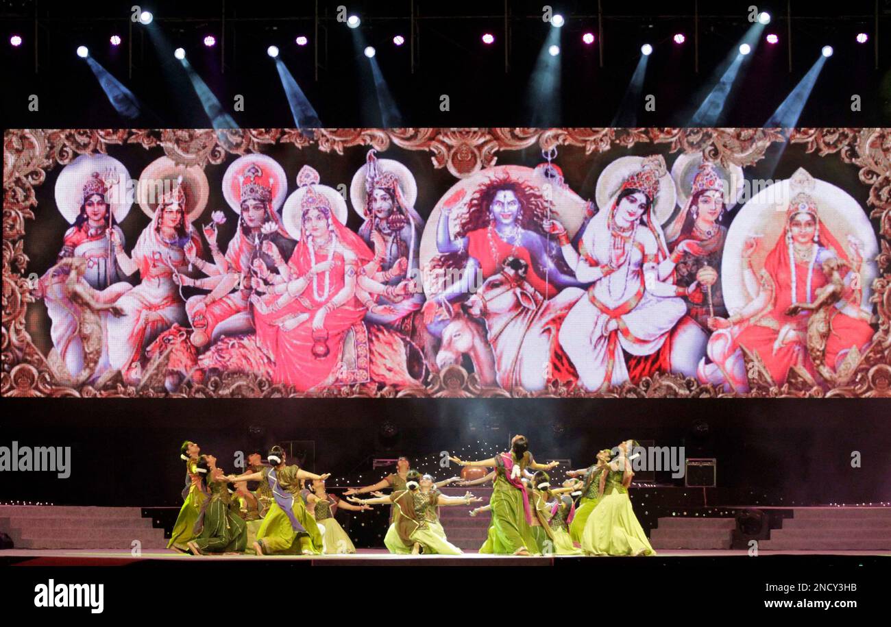 In this photo taken Sunday, Oct. 10, 2010, artists wearing traditional ...