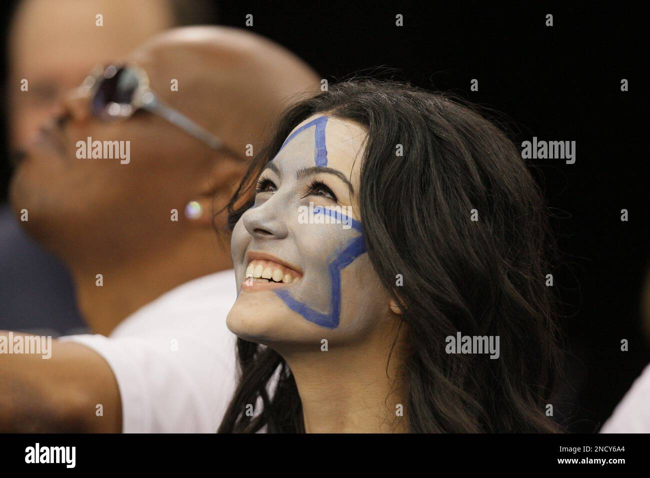 A Dallas Cowboys fan is seen during the first half of an NFL football ...