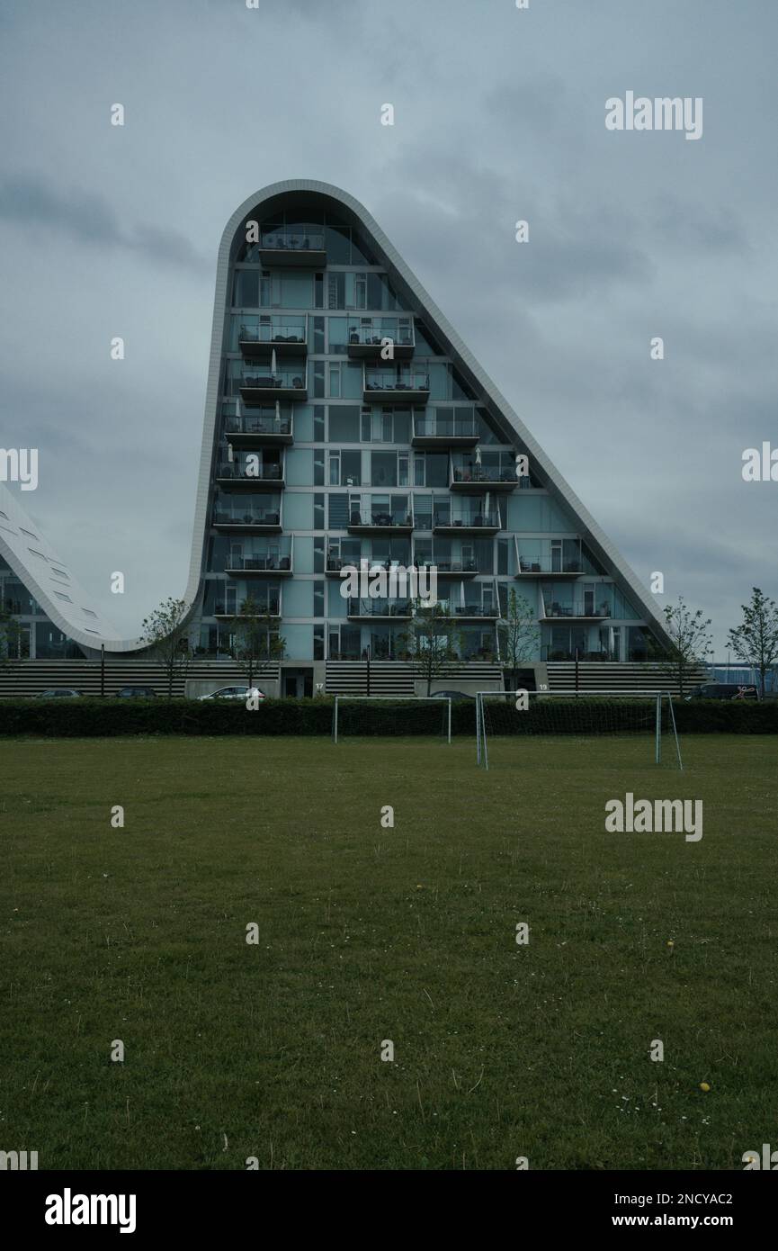 A low-angle of the wave houses in Vejle, Denmark, modern architecture ...