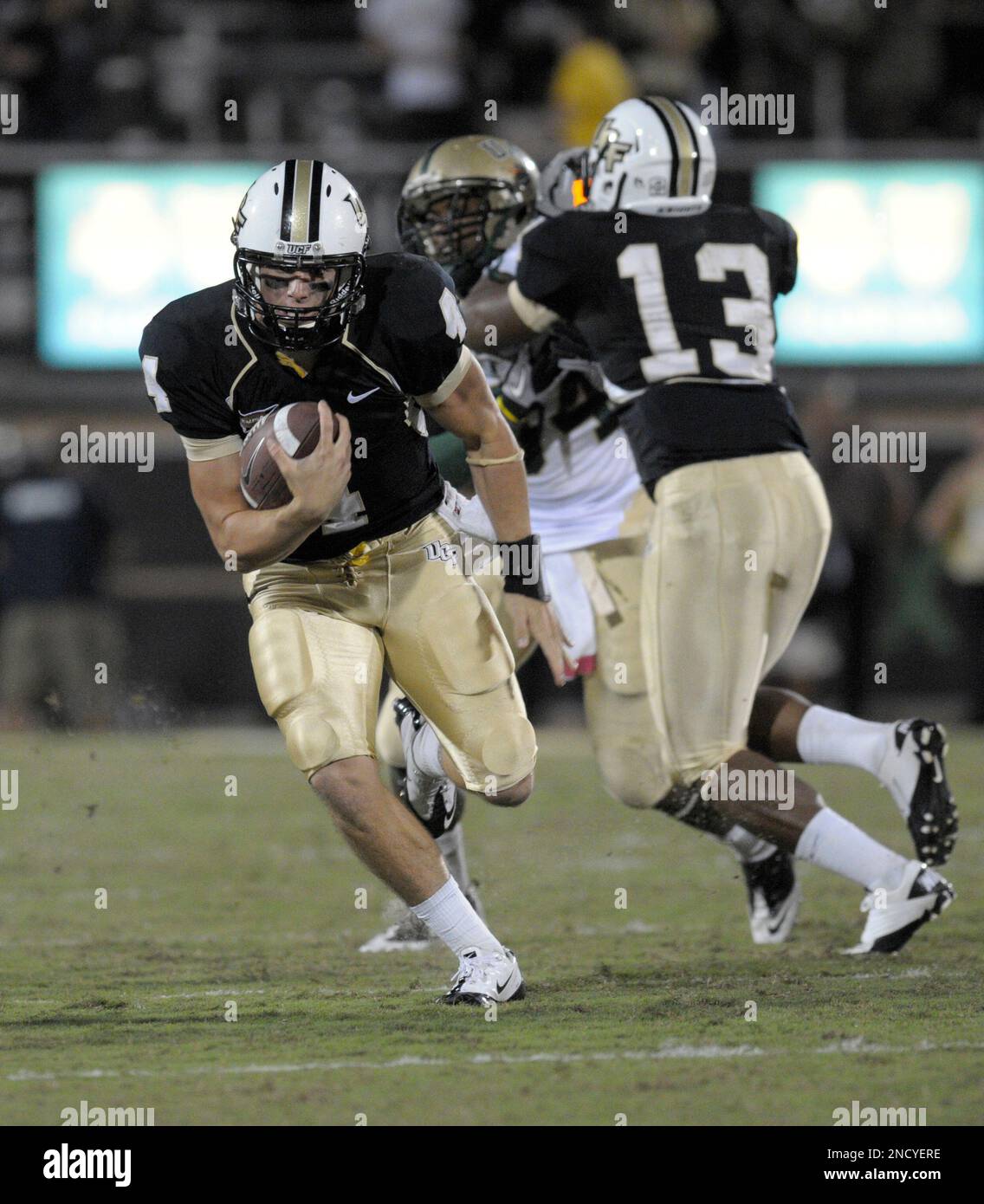 Central Florida quarterback Rob Calabrese (4) scrambles for yardage ...