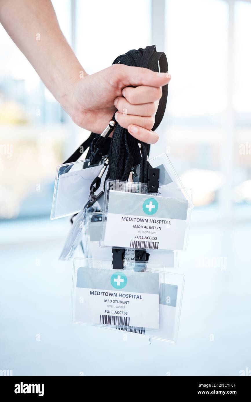 Doctor, hands or ID cards in hospital identification, names or icu pass ...