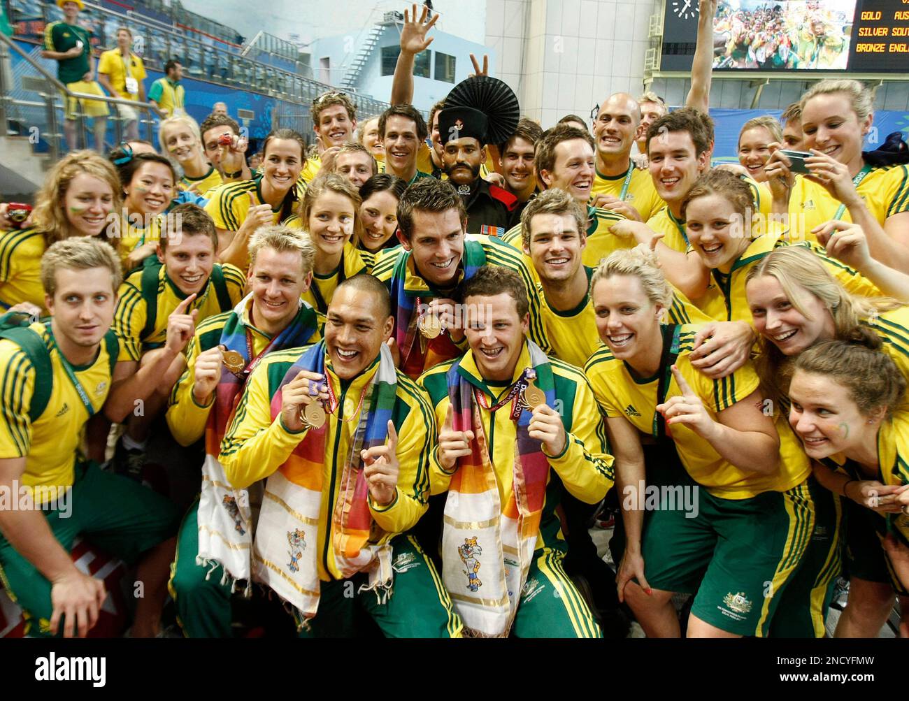 Various gold medal winners from the Australian swim team, including the ...