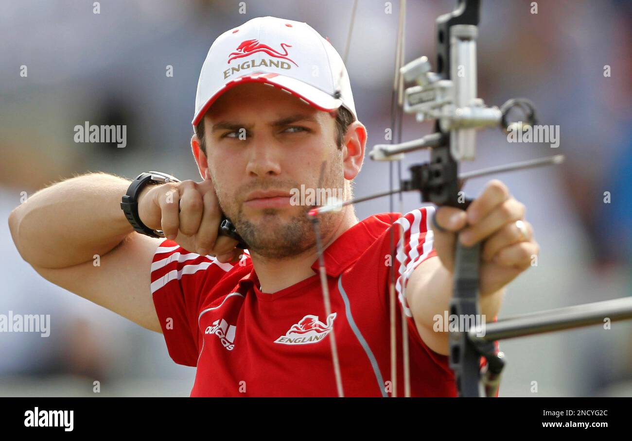 England's Duncan Edward Craig Busby releases an arrow on his way to ...