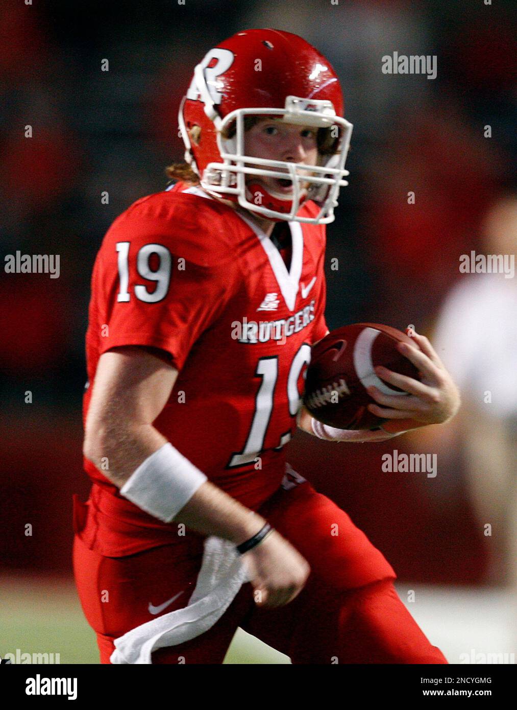 Rutgers' quarterback Chas Dodd (19) runs with the ball while playing ...