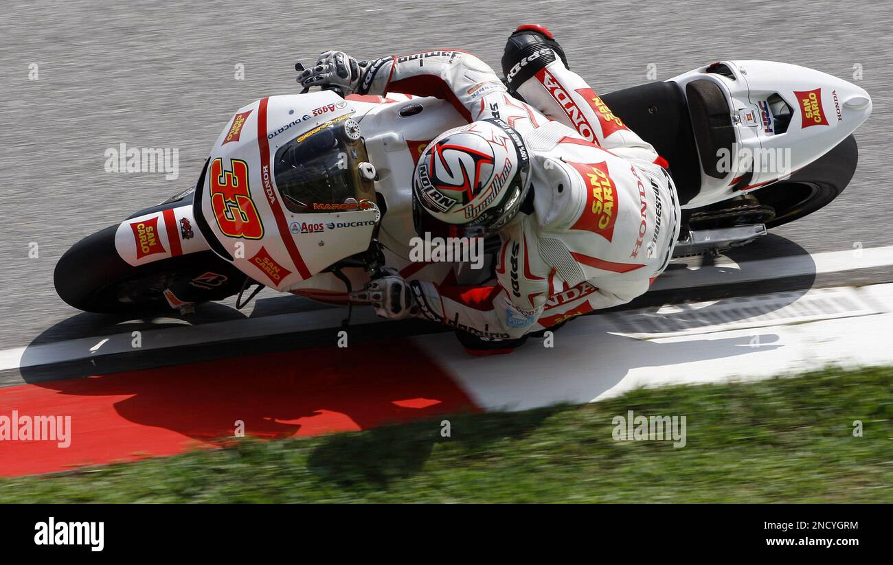 Italy's MotoGP rider Marco Melandri steers his Honda during the second ...