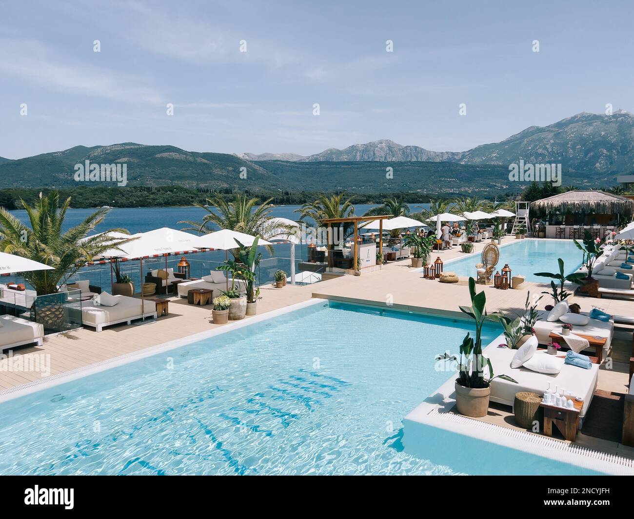 Private beach with double sun loungers near the pools by the sea Stock ...