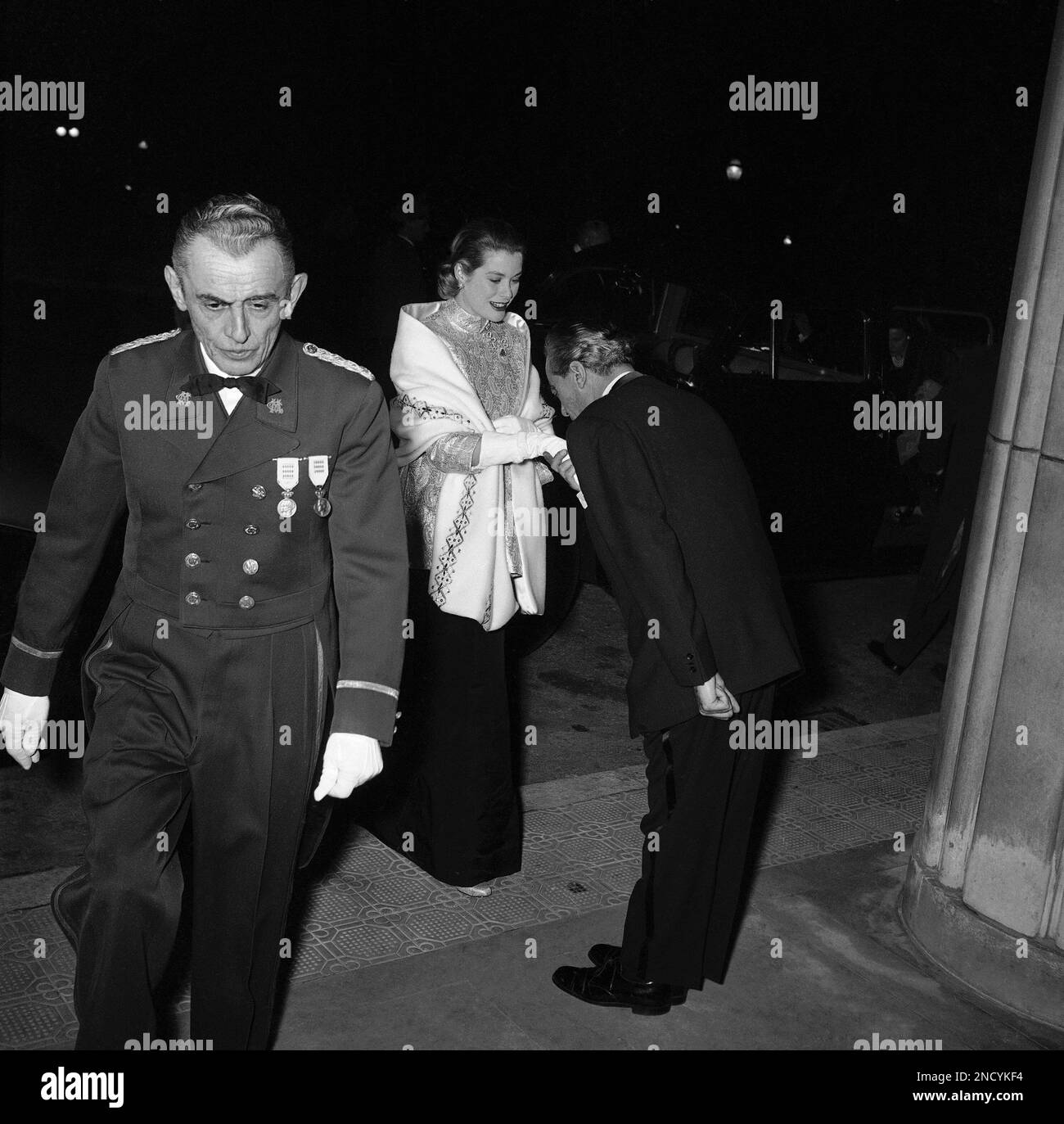 Pierre Rey, right, administrator to Prince Rainier of Monaco, kisses ...