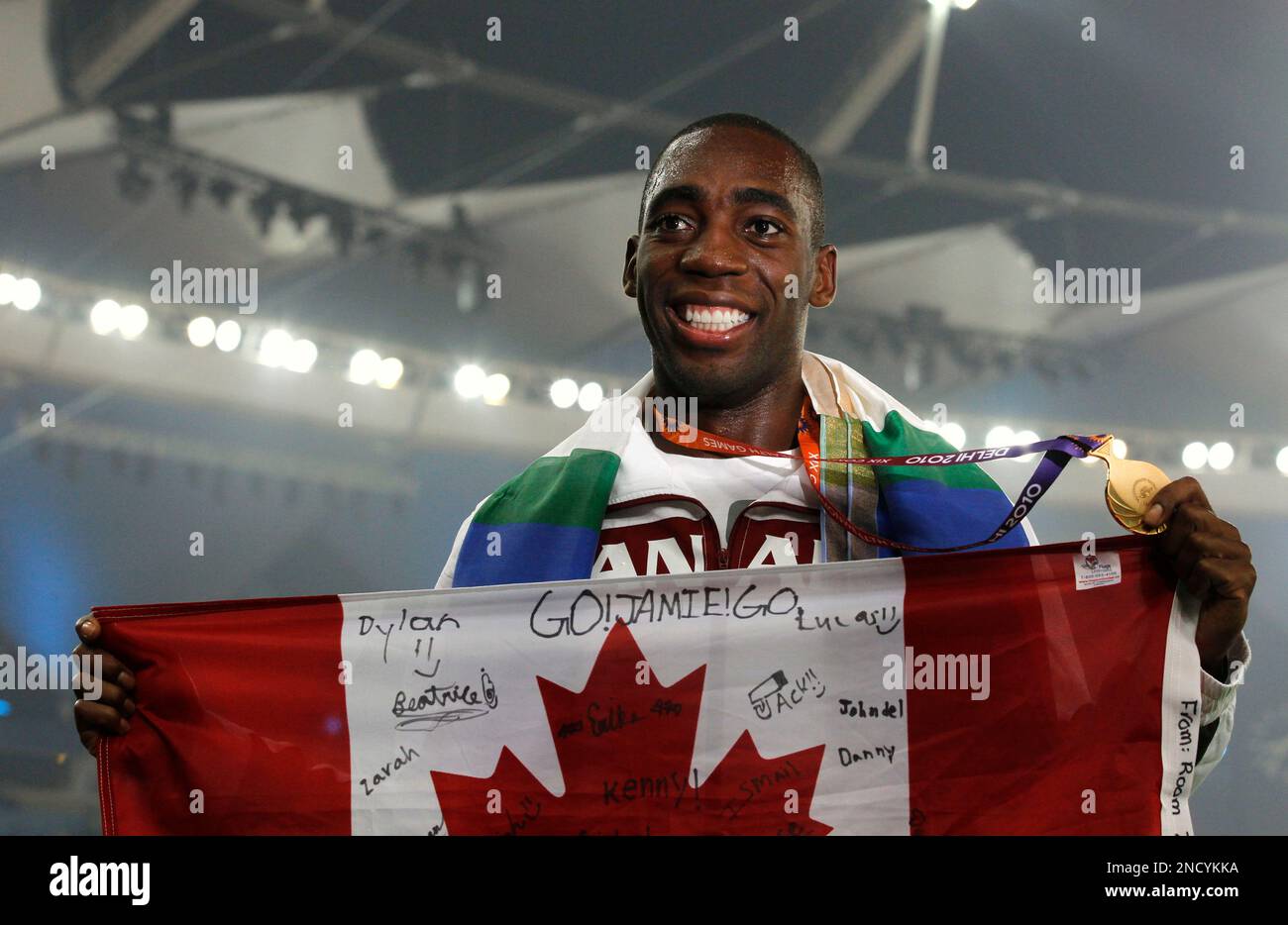 Canada's Jamie Adjetey-Nelson poses with his gold medal for the ...