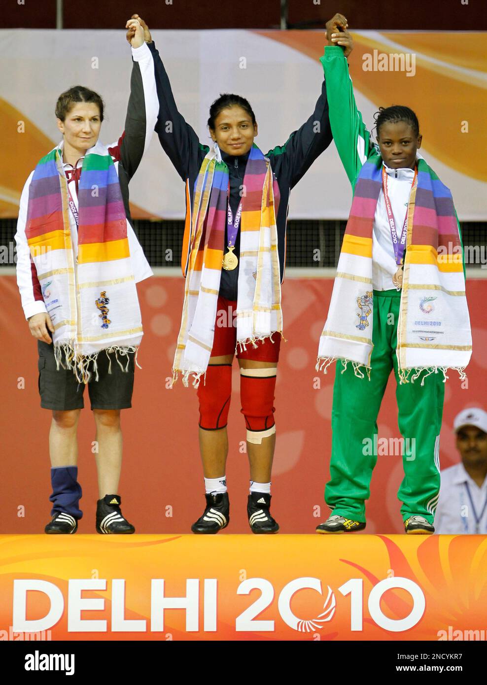 From left to right, Canada's Tonya Verbeek, India's Alka Tomar and ...