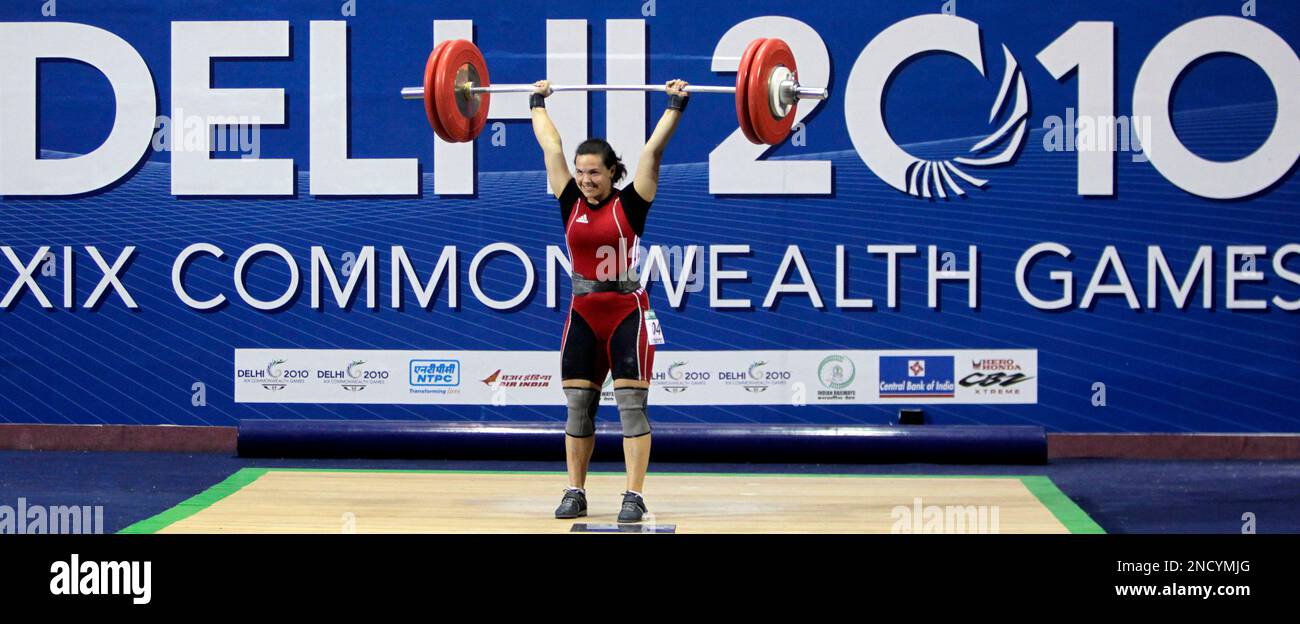 Canada's Christine Girard lifts 130kg in Clean and Jerk to make a ...