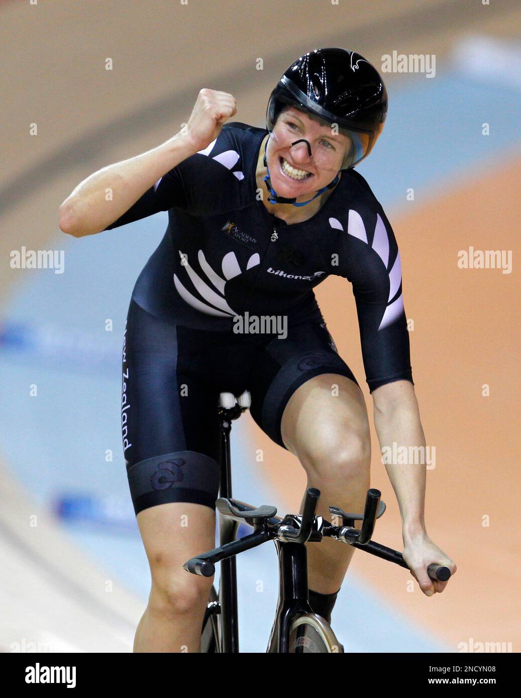 New Zealand's Alison Shanks reacts after winning gold in the women's ...