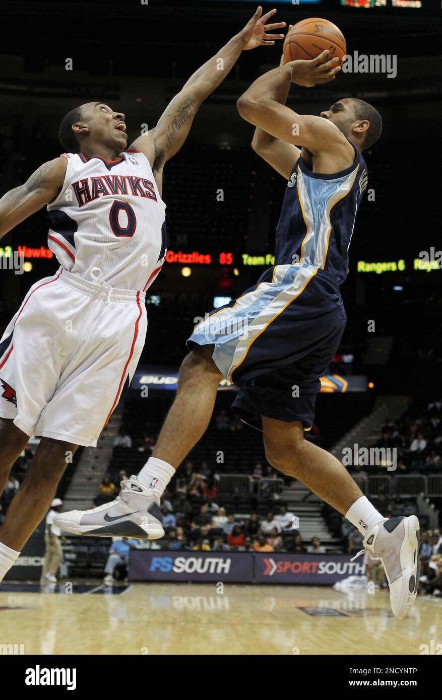 Memphis Grizzlies' Xavier Henry (13) takes a shot as Atlanta Hawks ...