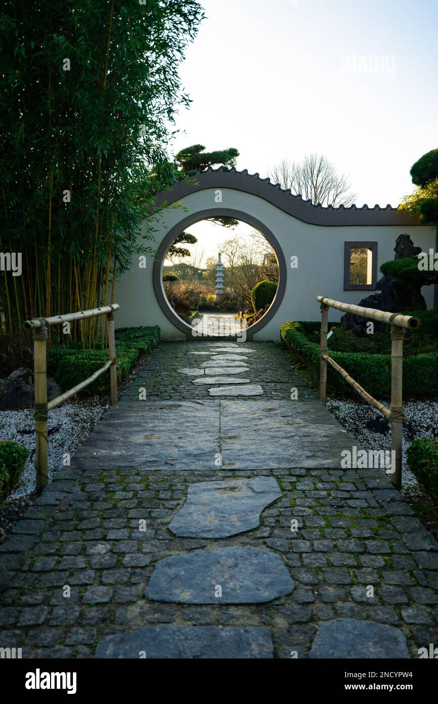 Moongate in a chinese garden Stock Photo - Alamy