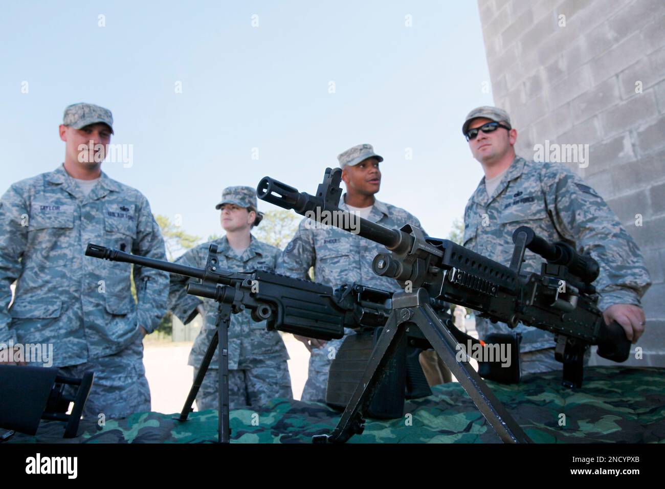 Members of the 96th Ground Combat Training Squadron are shown with an ...