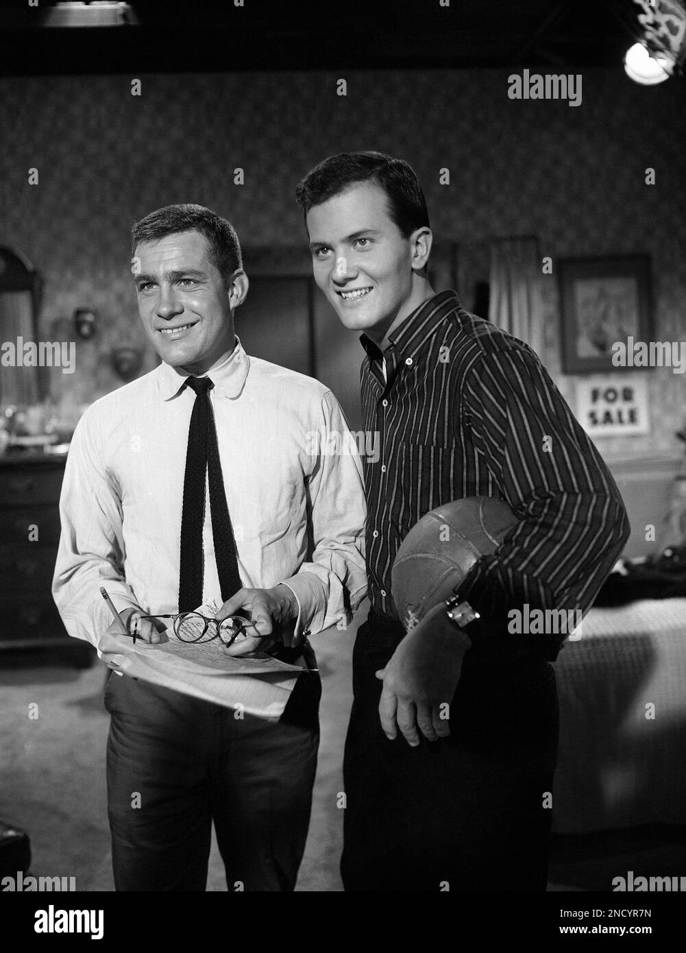 Singer Pat Boone, right, talks things over with Jack Larsen as the boys ...