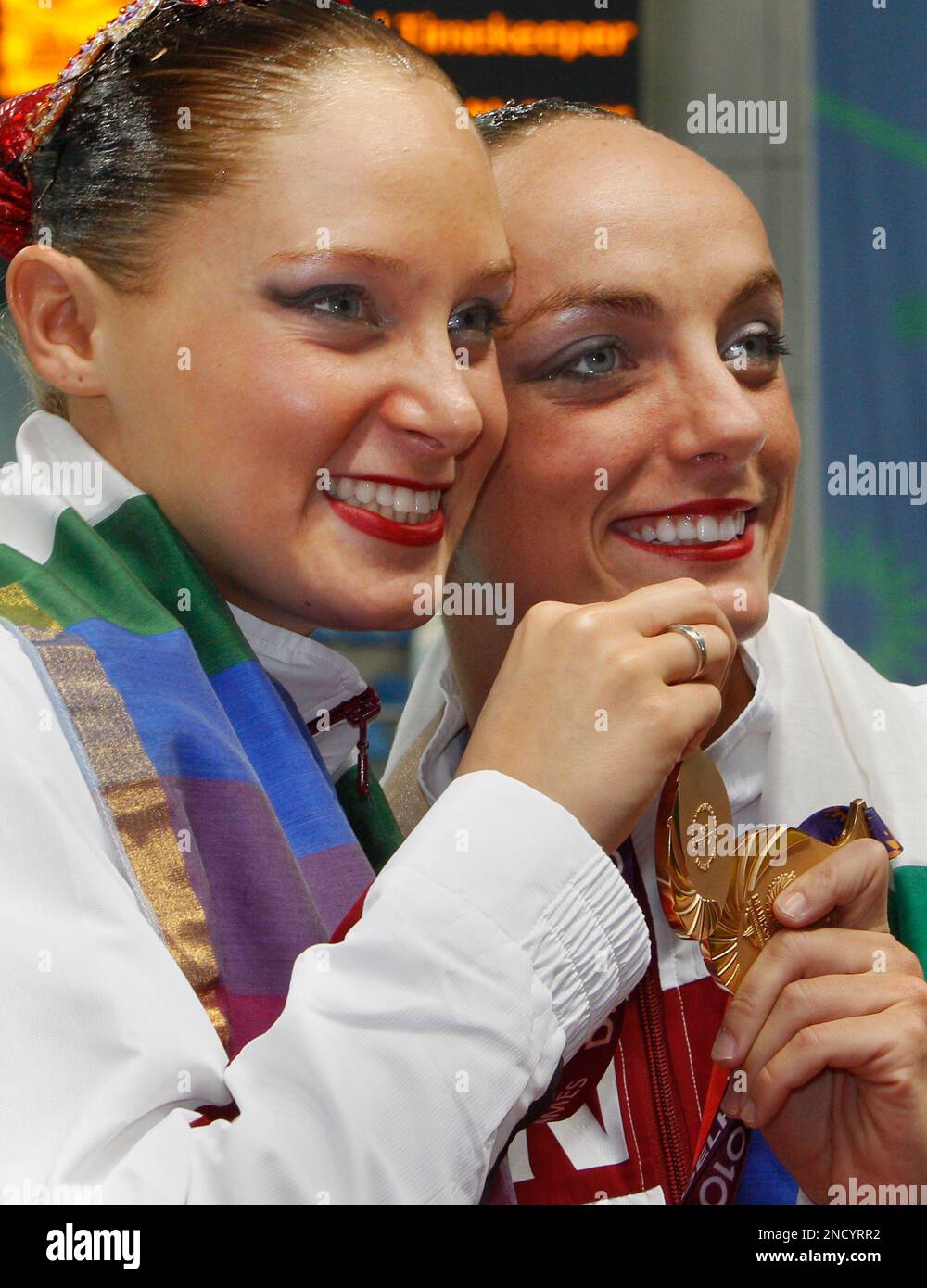 Canada's Marie-Pier Boudreau-Gagnon, right, and Chloe Isaac pose with ...