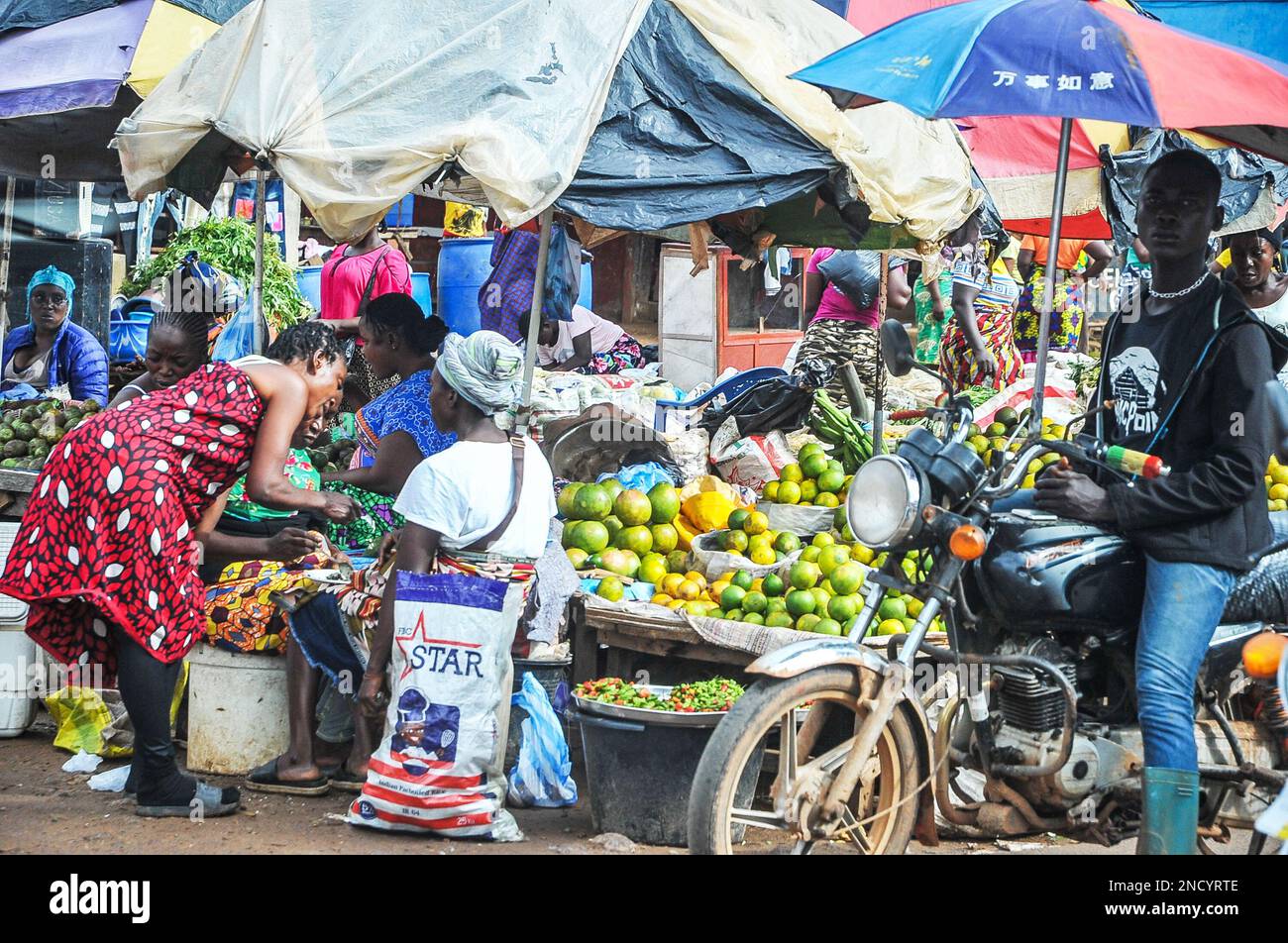 Buying and Selling on a busy Monrovia - Gbarnga Highway. The market is ...