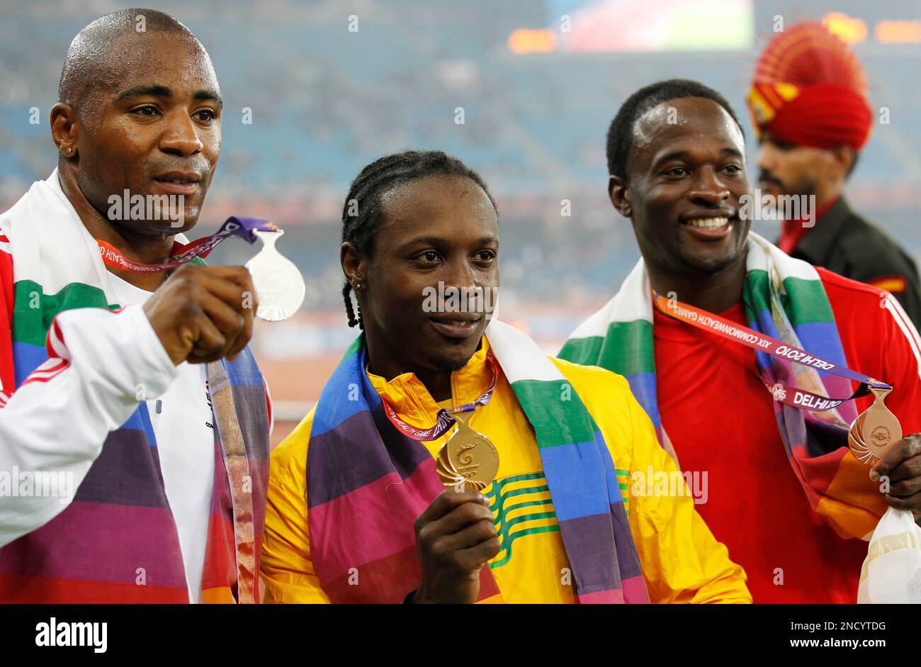 From left, England's Mark Lewis-Francis, Jamaica's Lerone Clarke, and ...